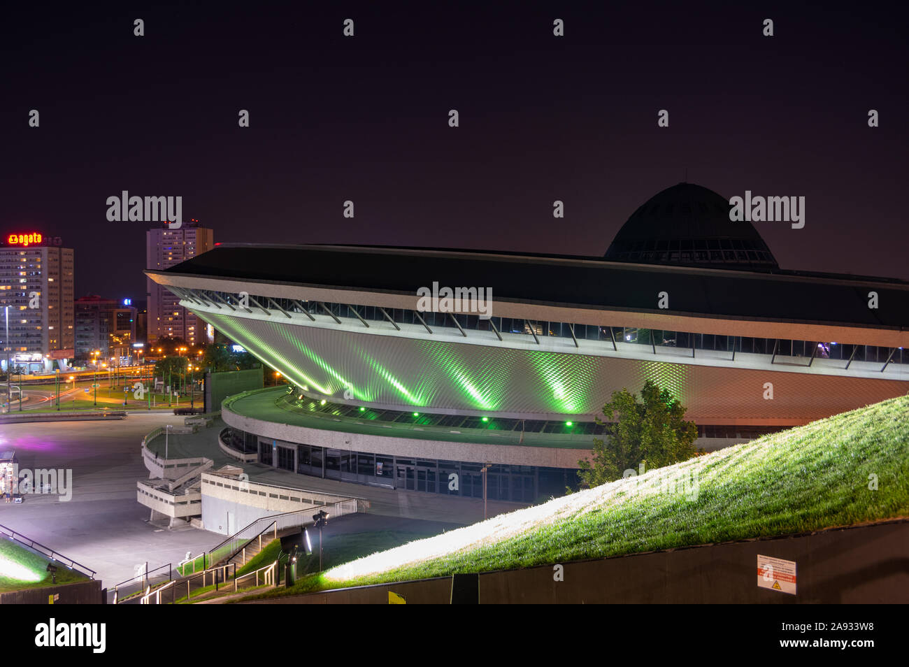 Spodek arena late evening, east side, green lights Stock Photo - Alamy