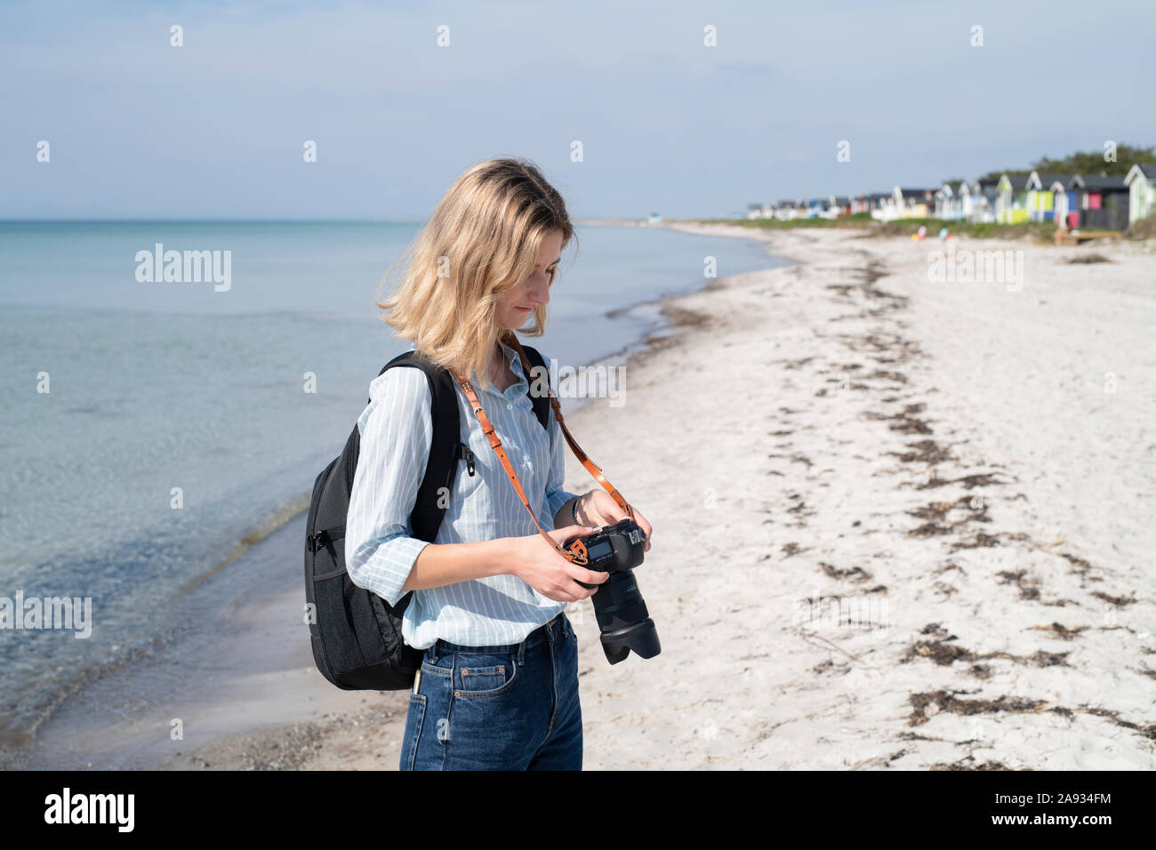 Blonde woman on beach hi-res stock photography and images - Alamy