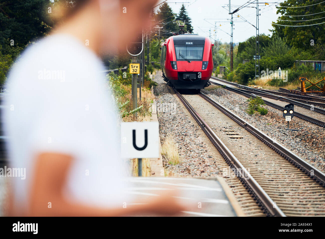 Train on train tracks Stock Photo - Alamy
