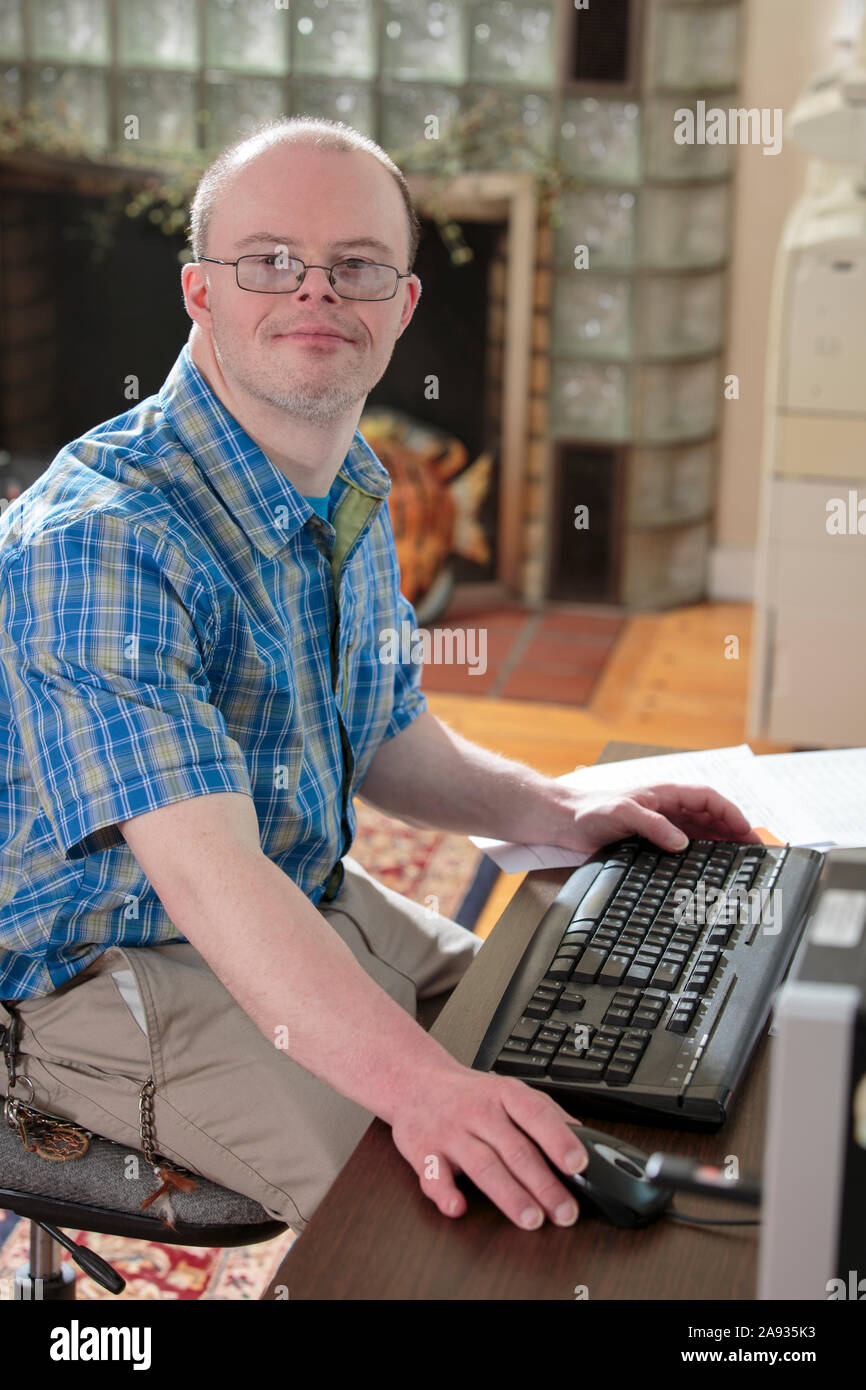 Down syndrome computer hi-res stock photography and images - Alamy