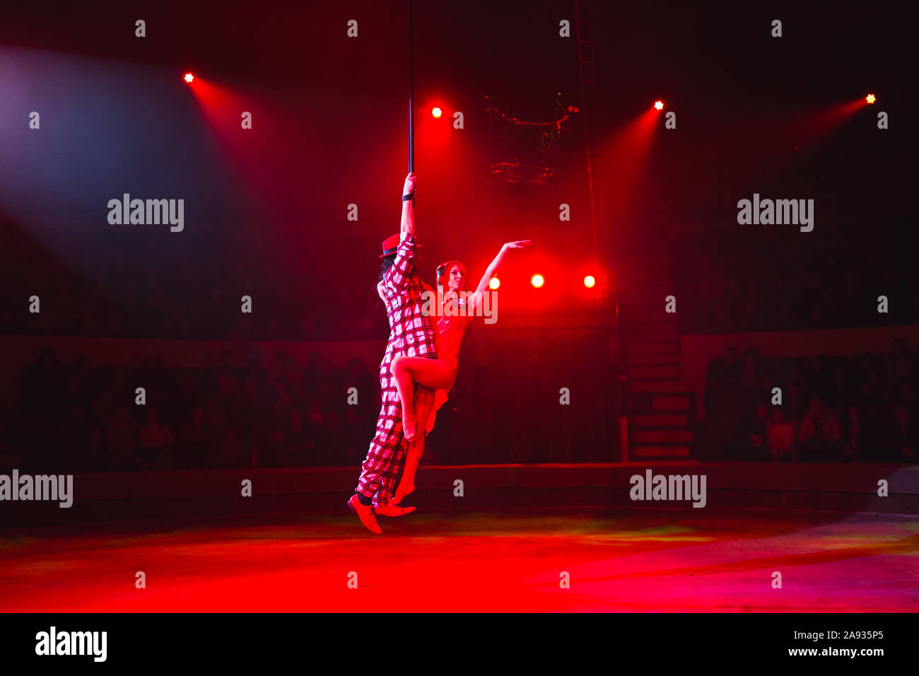 performance of aerialists in the circus arena Stock Photo - Alamy