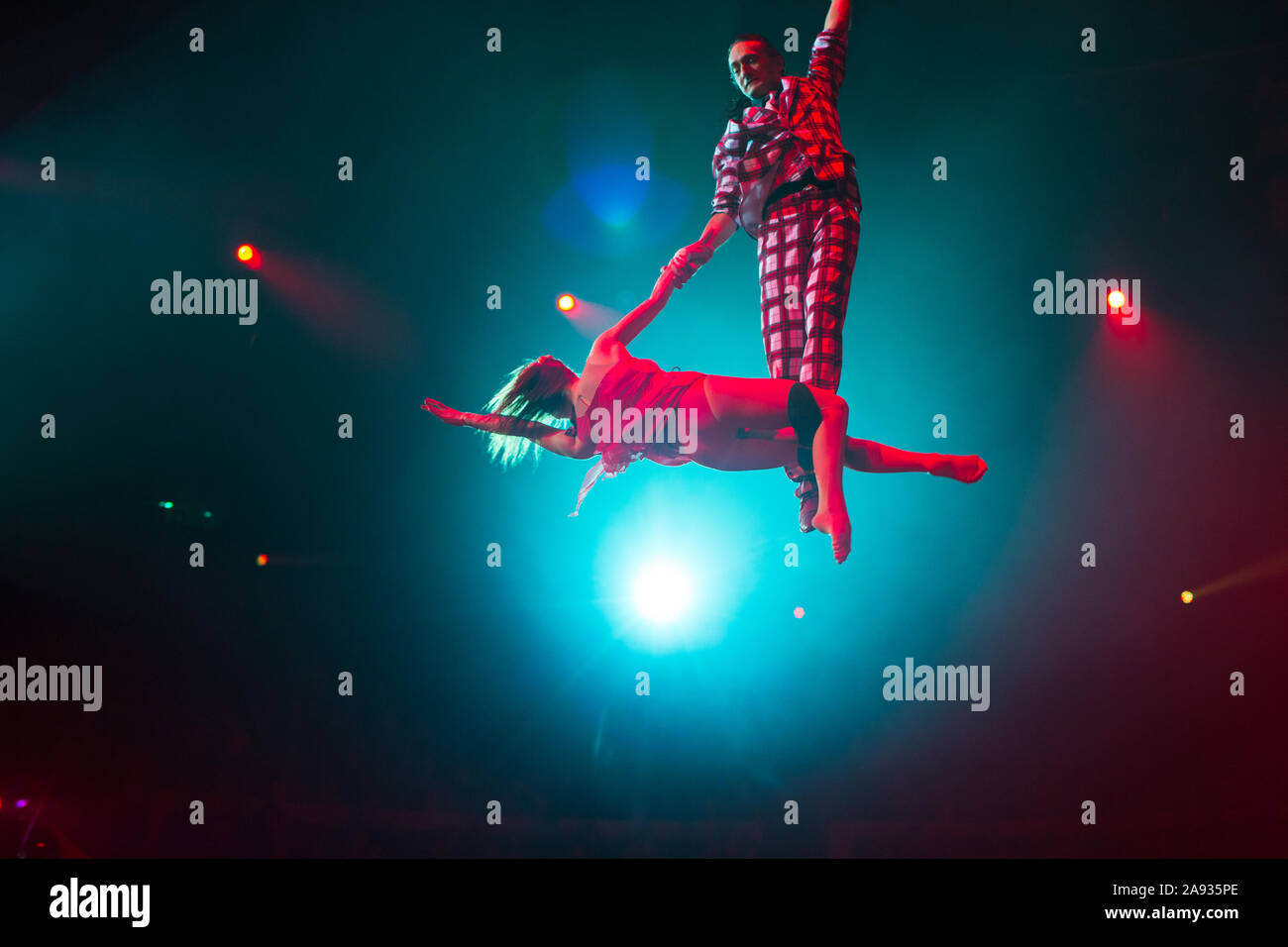 performance of aerialists in the circus arena Stock Photo - Alamy