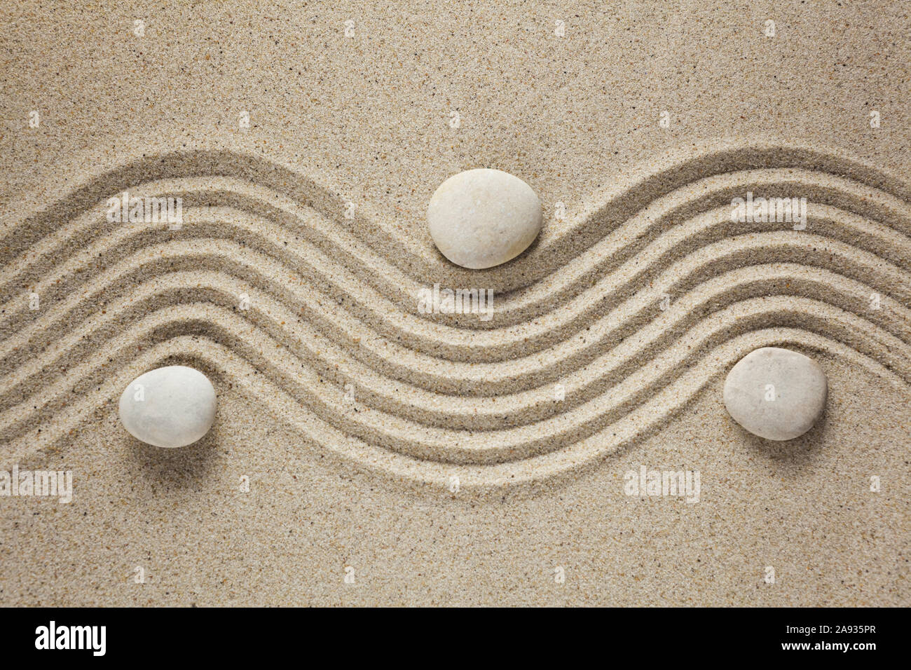 zen garden stones in sand for relaxation and concentration during ...