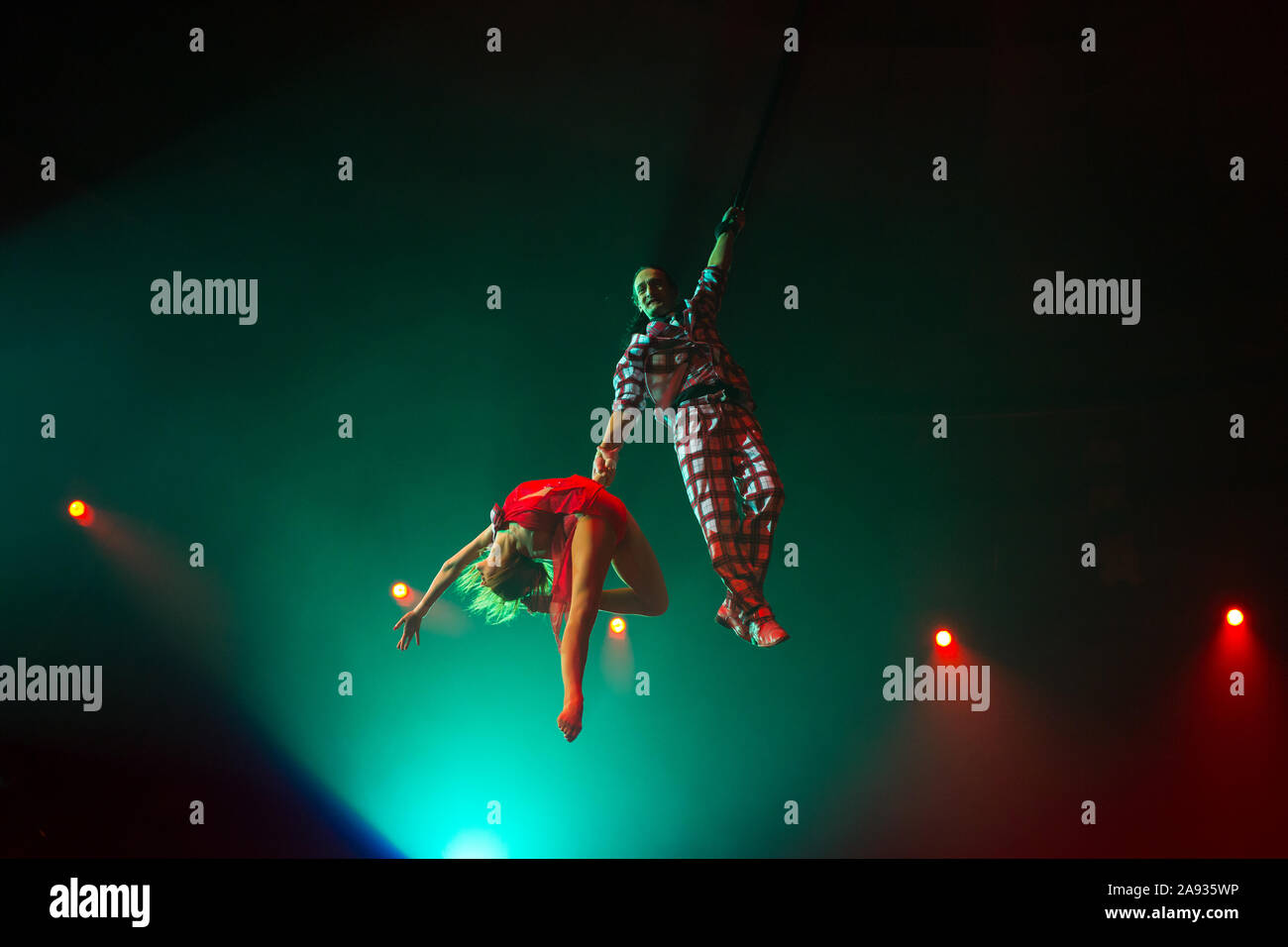 performance of aerialists in the circus arena Stock Photo - Alamy