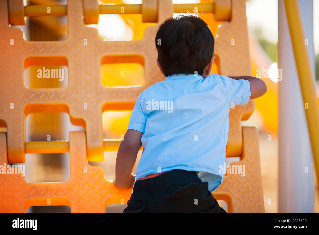 Toddler Climb Up Ladder High Resolution Stock Photography and Images ...