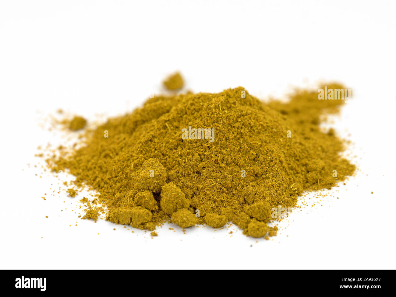 Curry powder in front of white background Stock Photo - Alamy