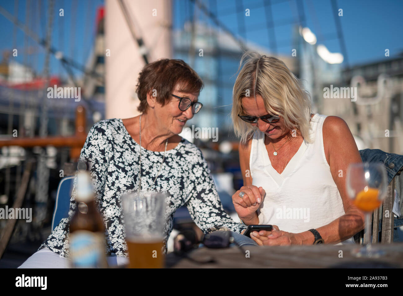 Female friends on boat Stock Photo - Alamy