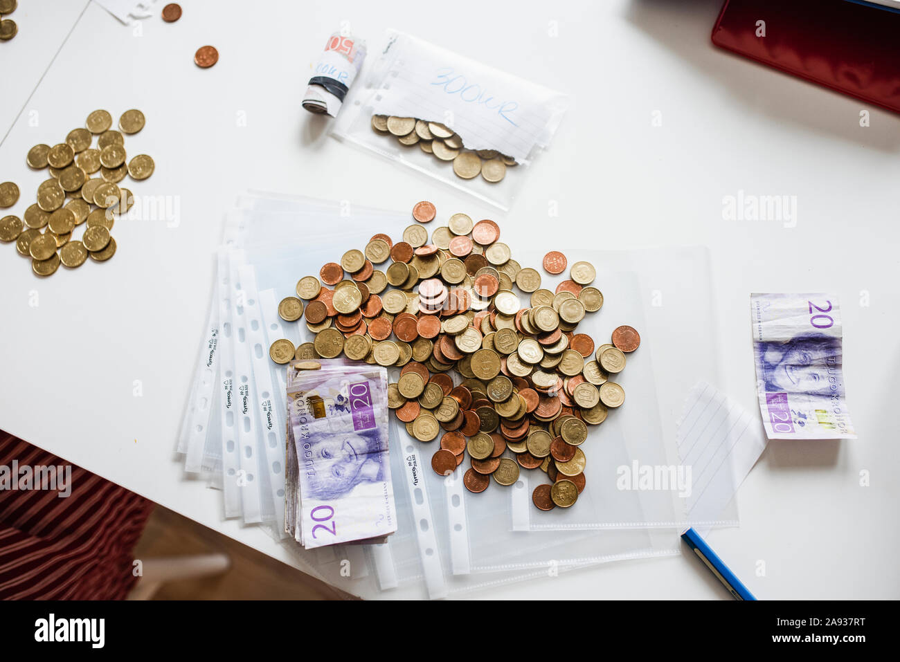 Coins and banknotes Stock Photo - Alamy