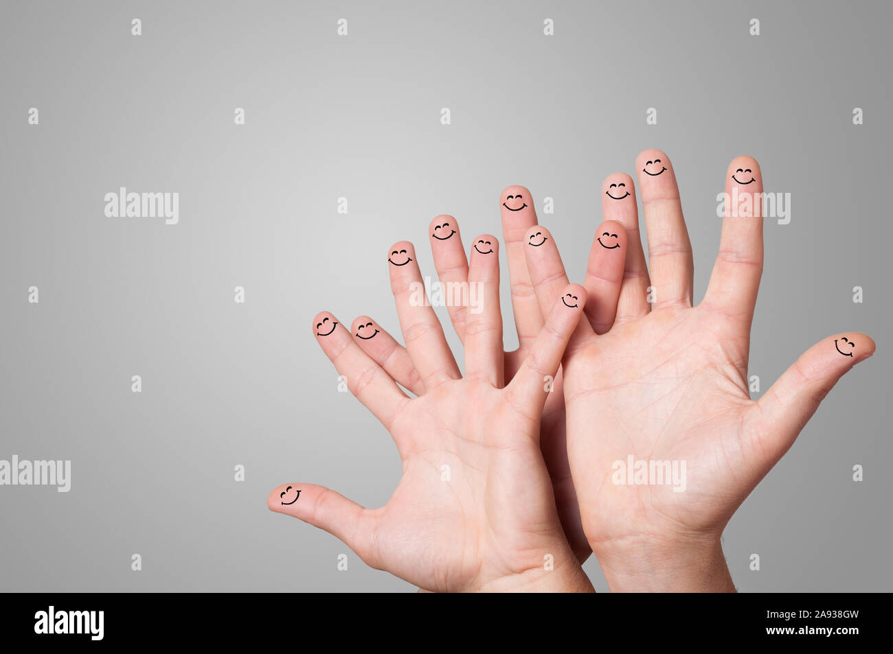 Happy face fingers hugs each other Stock Photo - Alamy