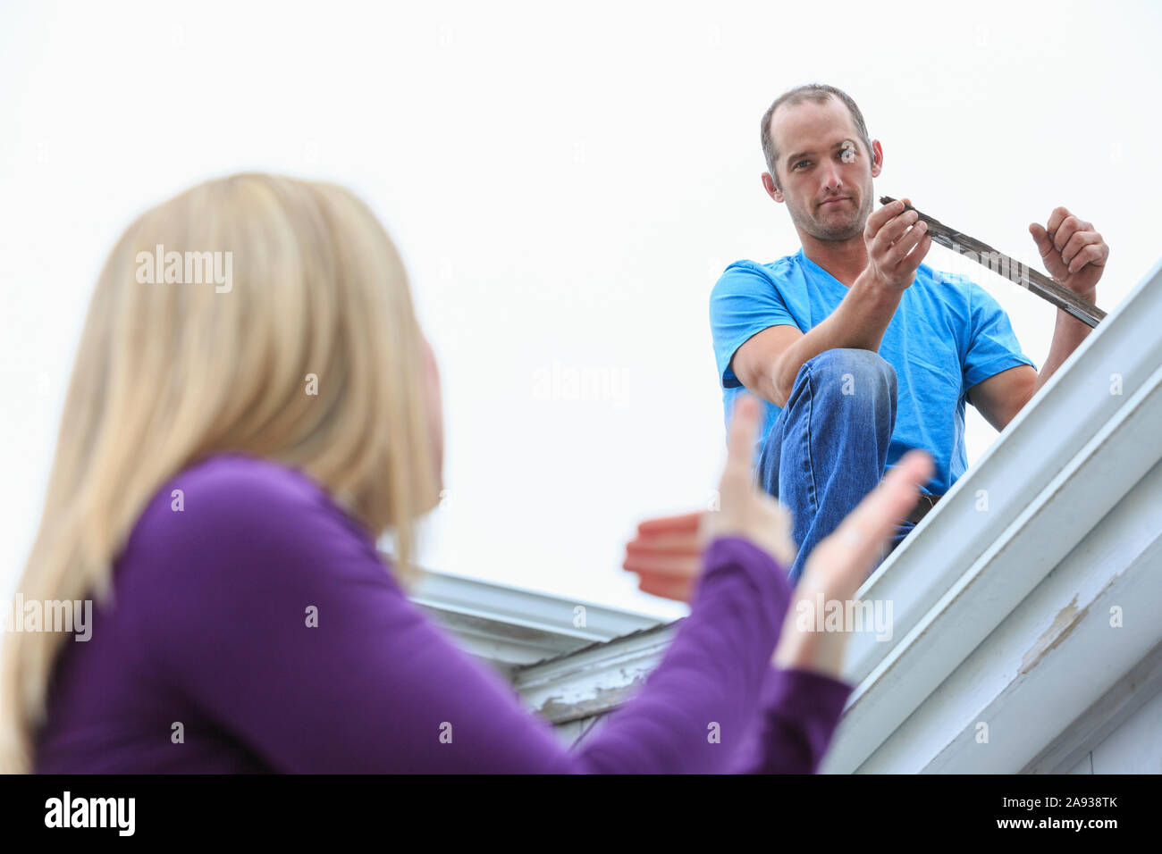 Homeowner signing, Old needs replaced, in American Sign Language to a ...