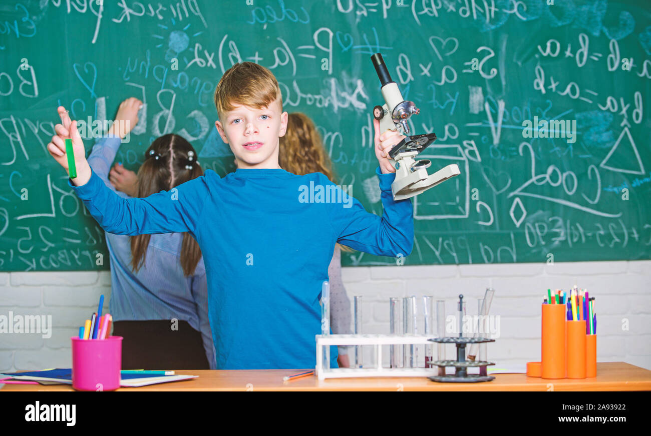 Little boy in lab. Chemistry science. biology experiments with ...