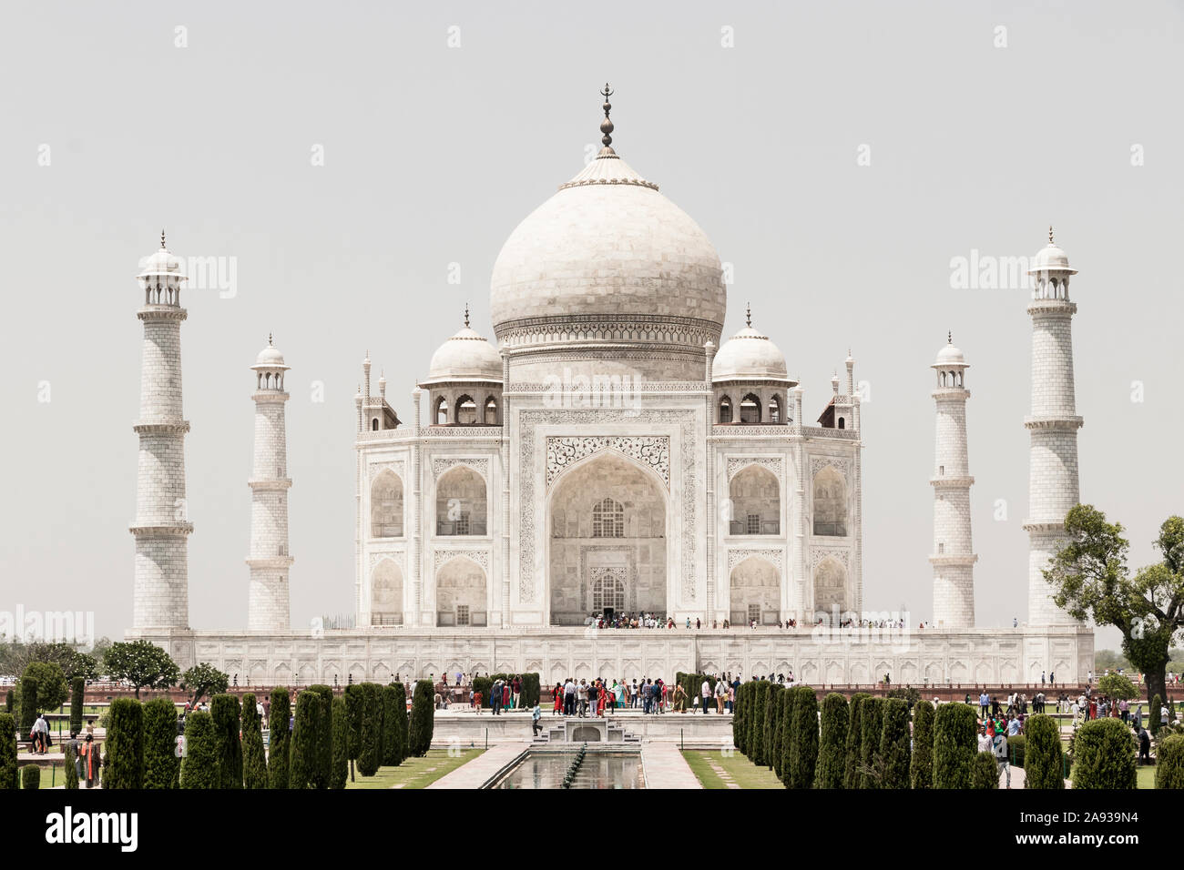 Many visitors to the Taj Mahal in Agra, India. Mogul marble mausoleum ...