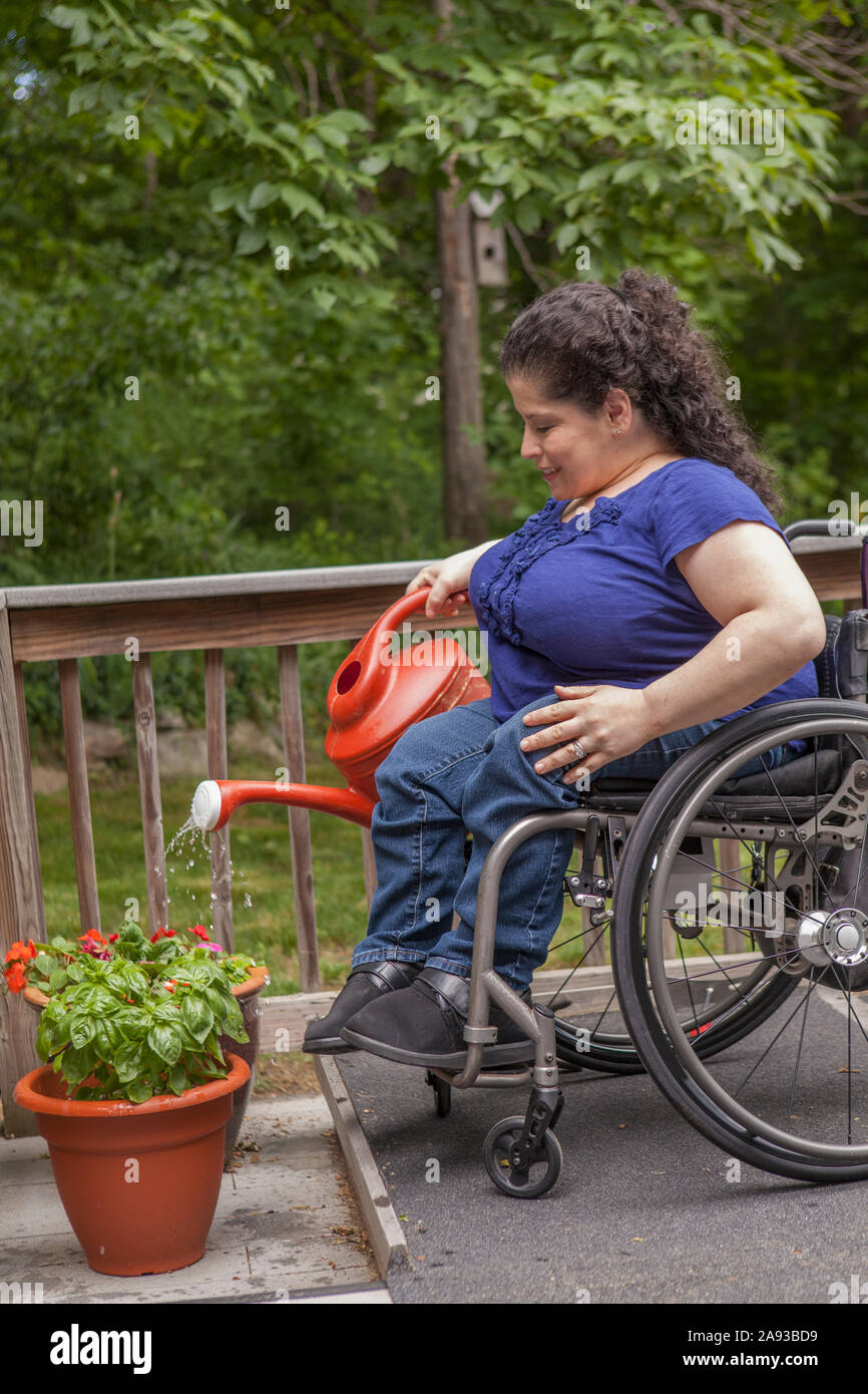Woman spina bifida in wheelchair hi-res stock photography and images ...