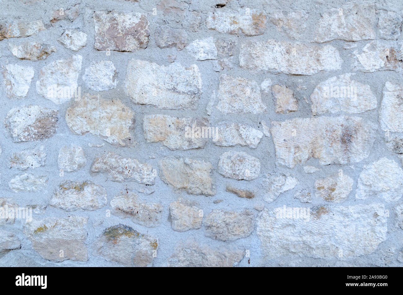 Plastered wall with stones hi-res stock photography and images - Alamy