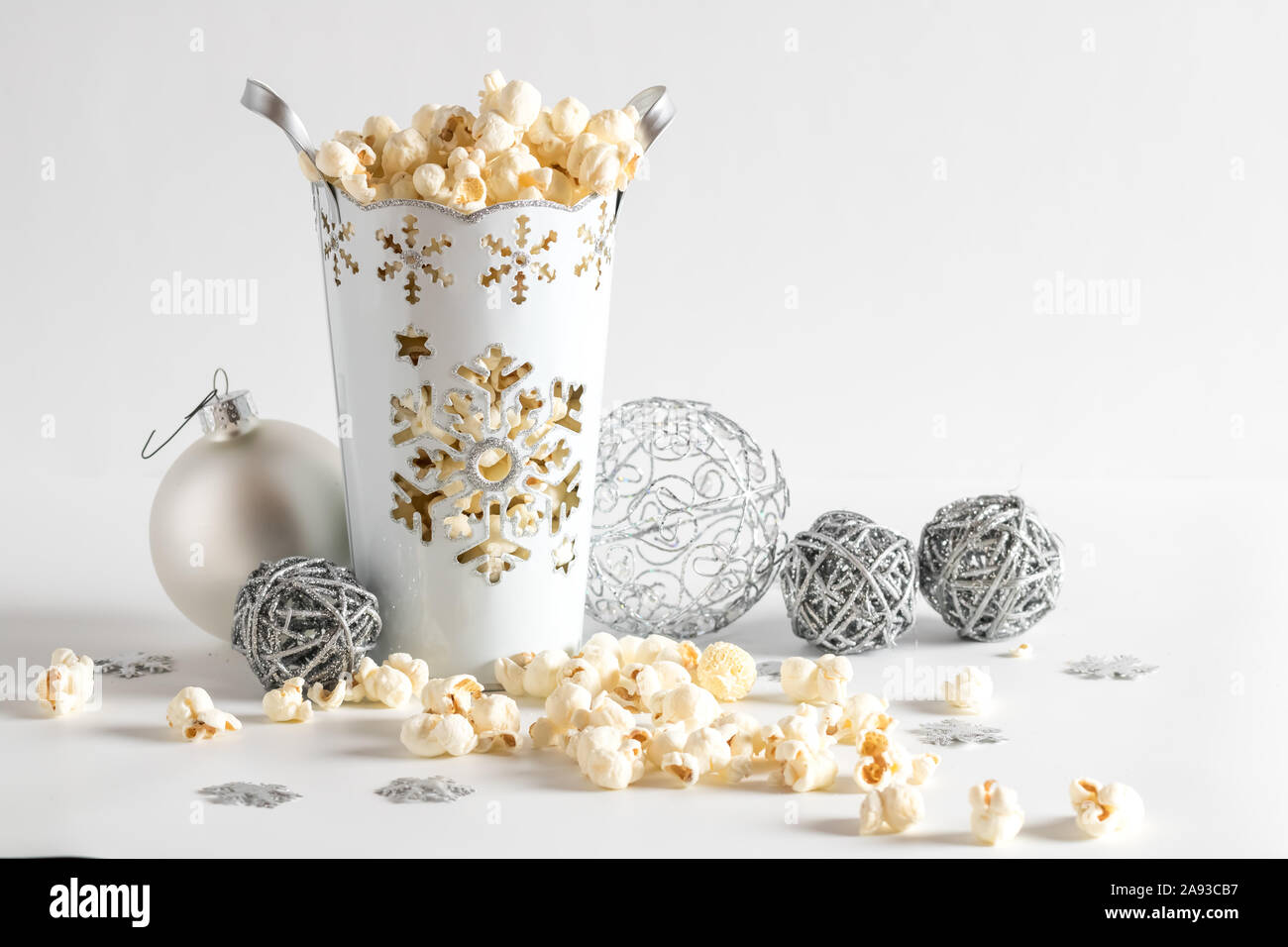 White cheddar popcorn with silver ornaments and copy space Stock Photo ...