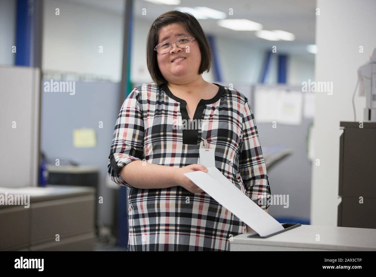 Disability working hi-res stock photography and images - Alamy