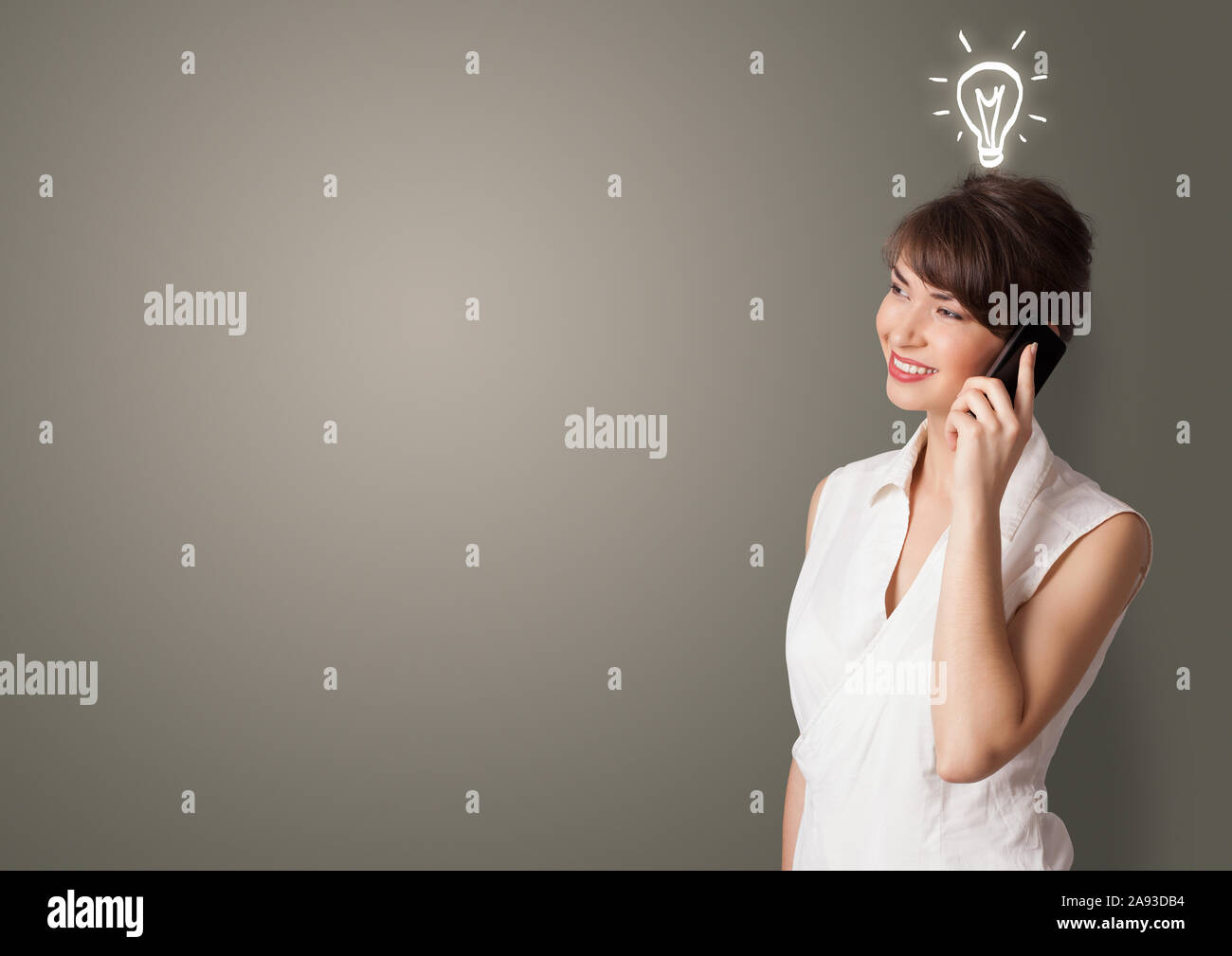 Young smiling person presenting new idea concept Stock Photo - Alamy