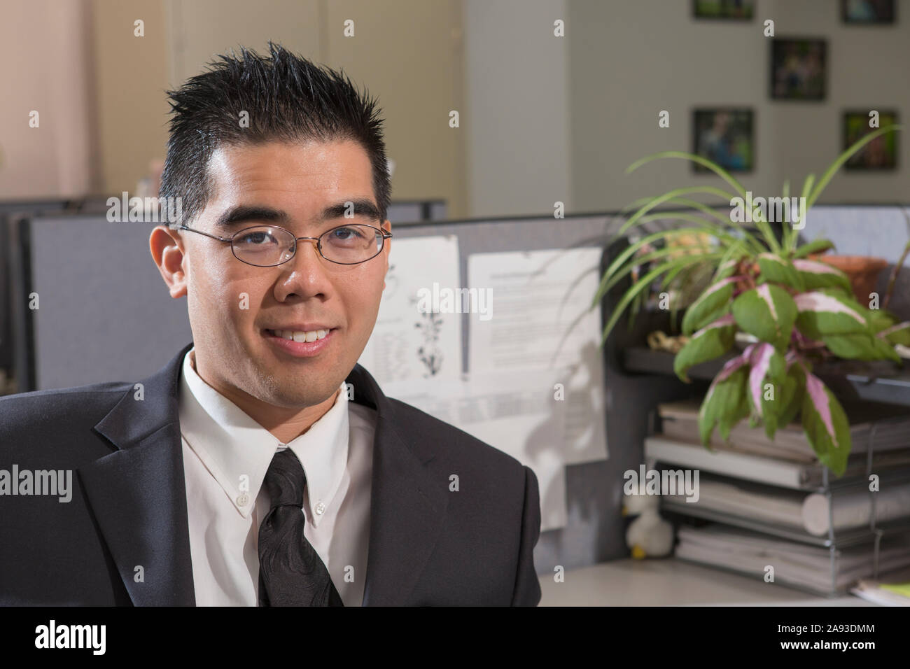 Portrait of Asian man with Autism working in an office Stock Photo - Alamy