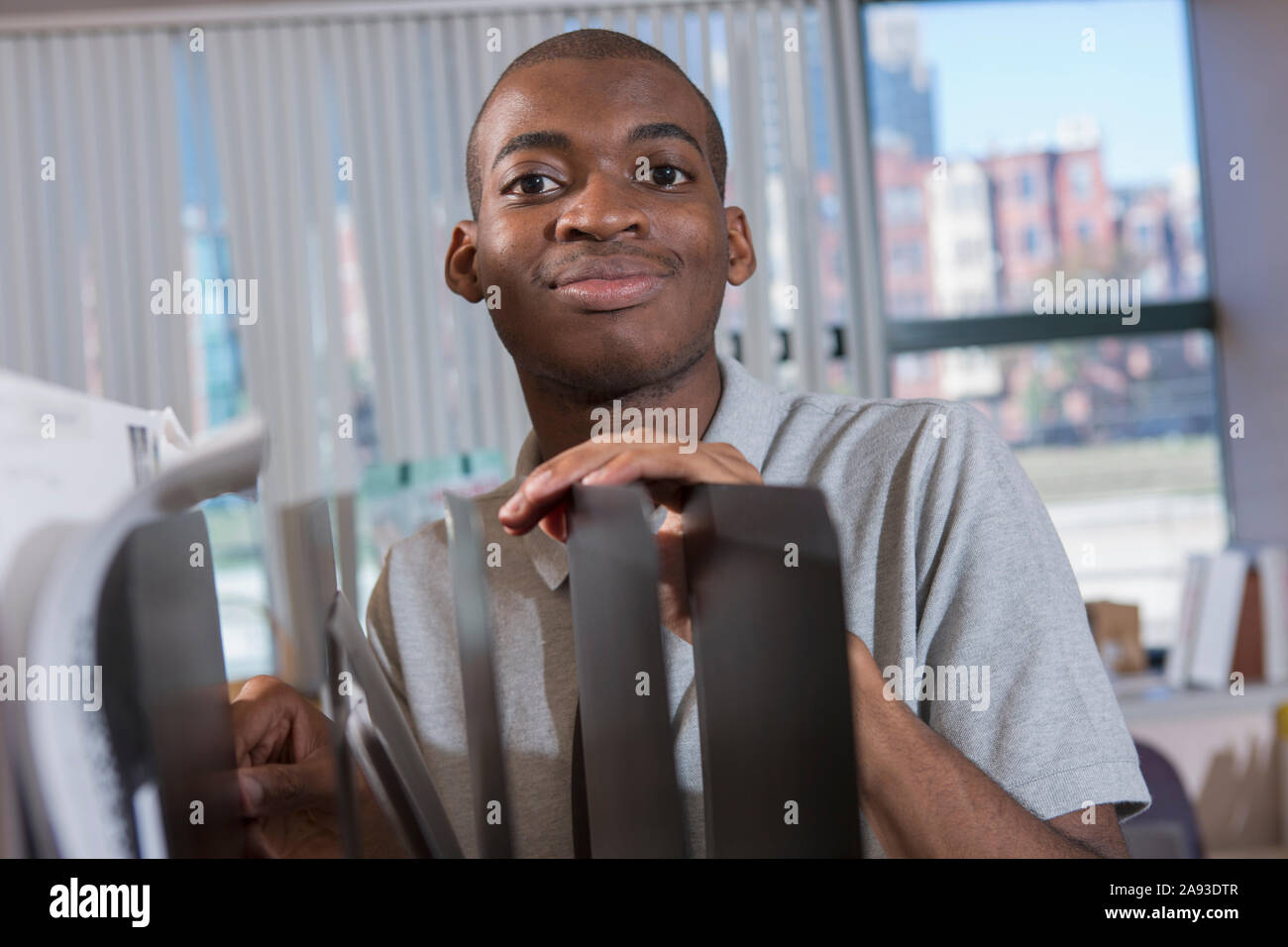 Portrait man office working file hi-res stock photography and images ...