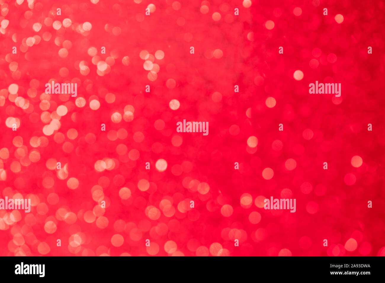 Super saturated vibrant red background of defocused boke sparkles Stock Photo - Alamy