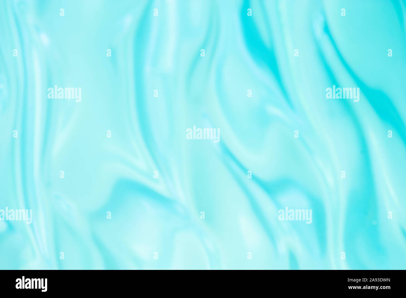 Full frame background of bright wintry blue defocused bright wave ...