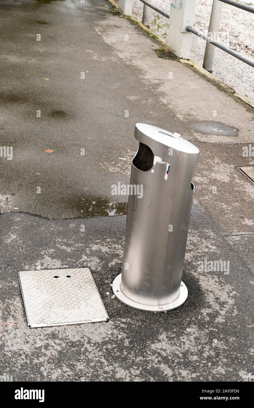 Trash can with bottom flap to open Stock Photo - Alamy
