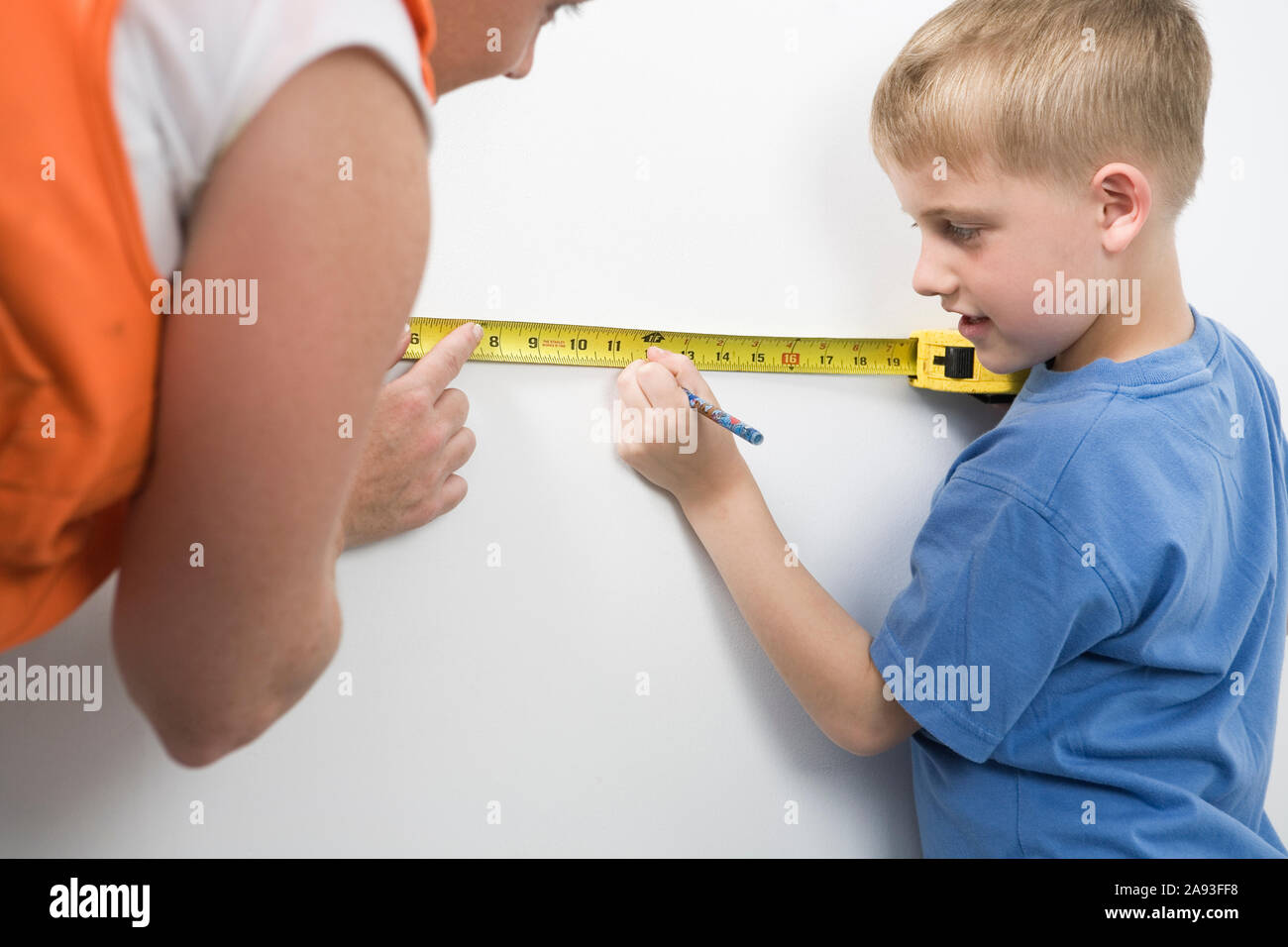 Child using tape hi-res stock photography and images - Alamy