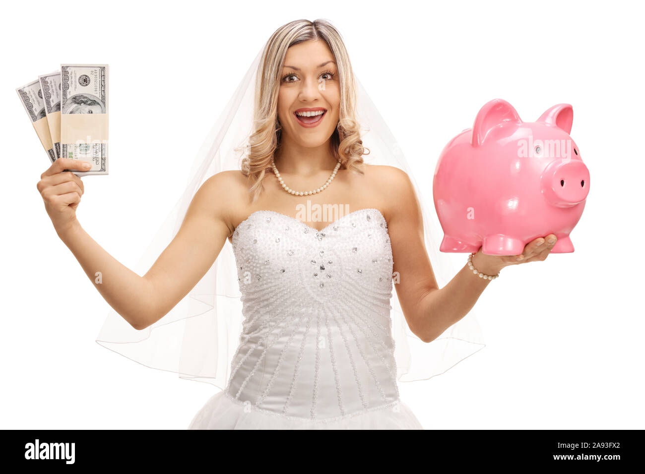 Happy bride holding money and a piggy bank isolated on white background ...