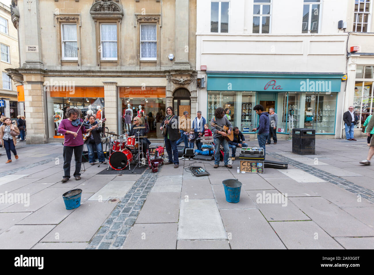 Street group busker with fiddle in Bath, Somerset, England, UK Stock ...
