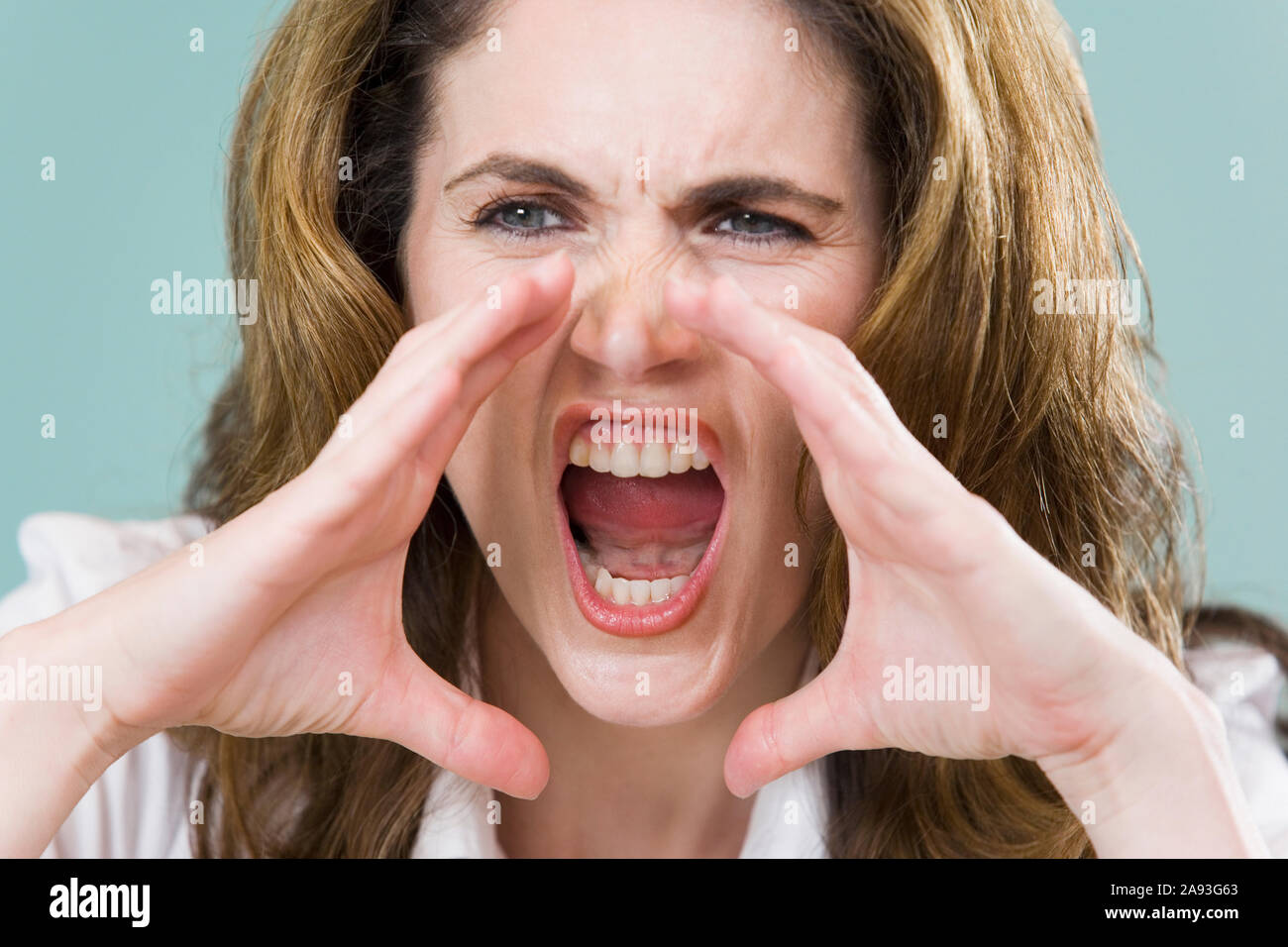 Woman noise pollution hi-res stock photography and images - Alamy