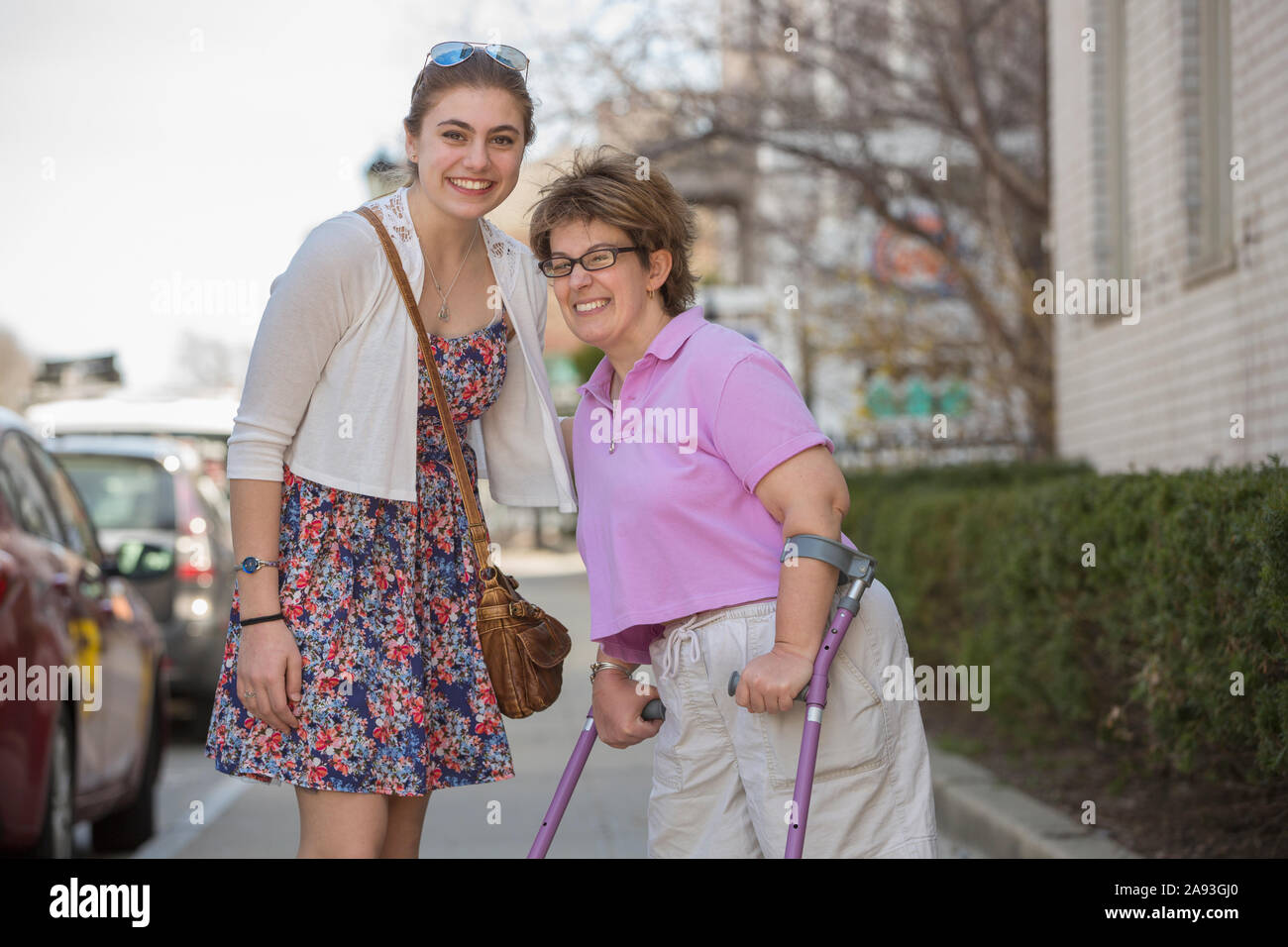 Woman with Cerebral Palsy and her sister Stock Photo - Alamy