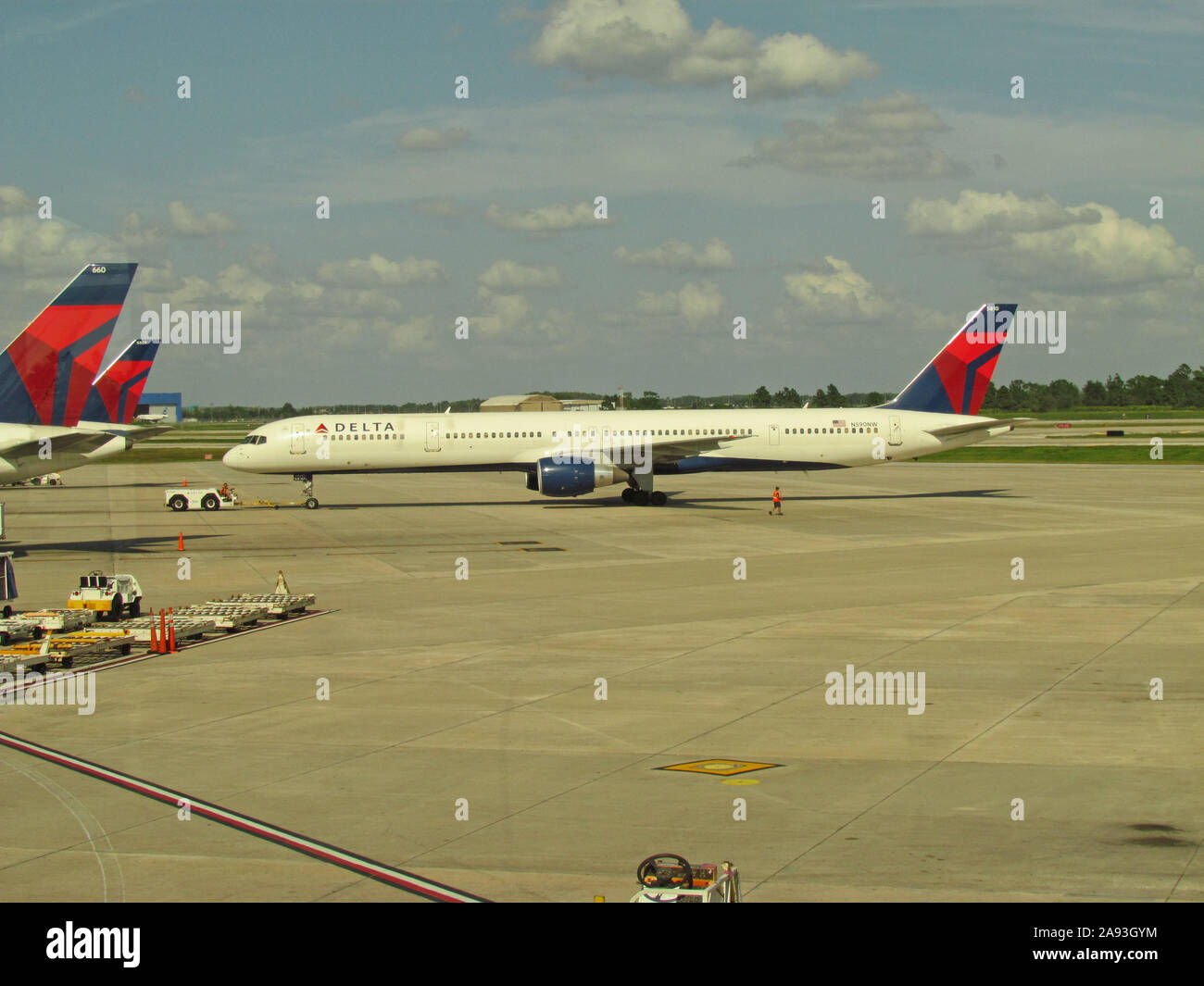 Delta Air Lines Boeing 757-351 N590NW being pushed back on the apron of ...