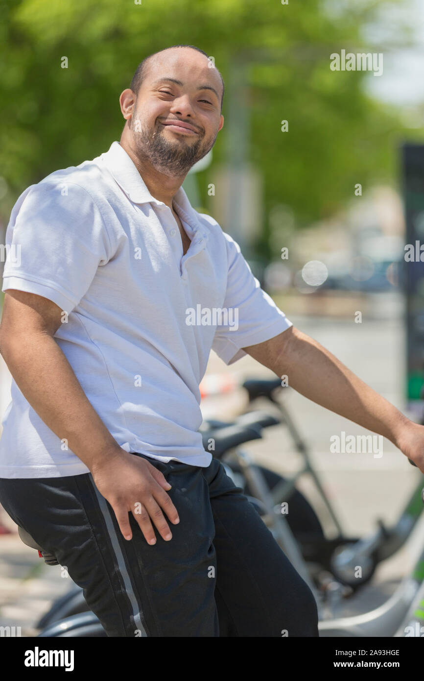 Disabled man on bike hi-res stock photography and images - Alamy