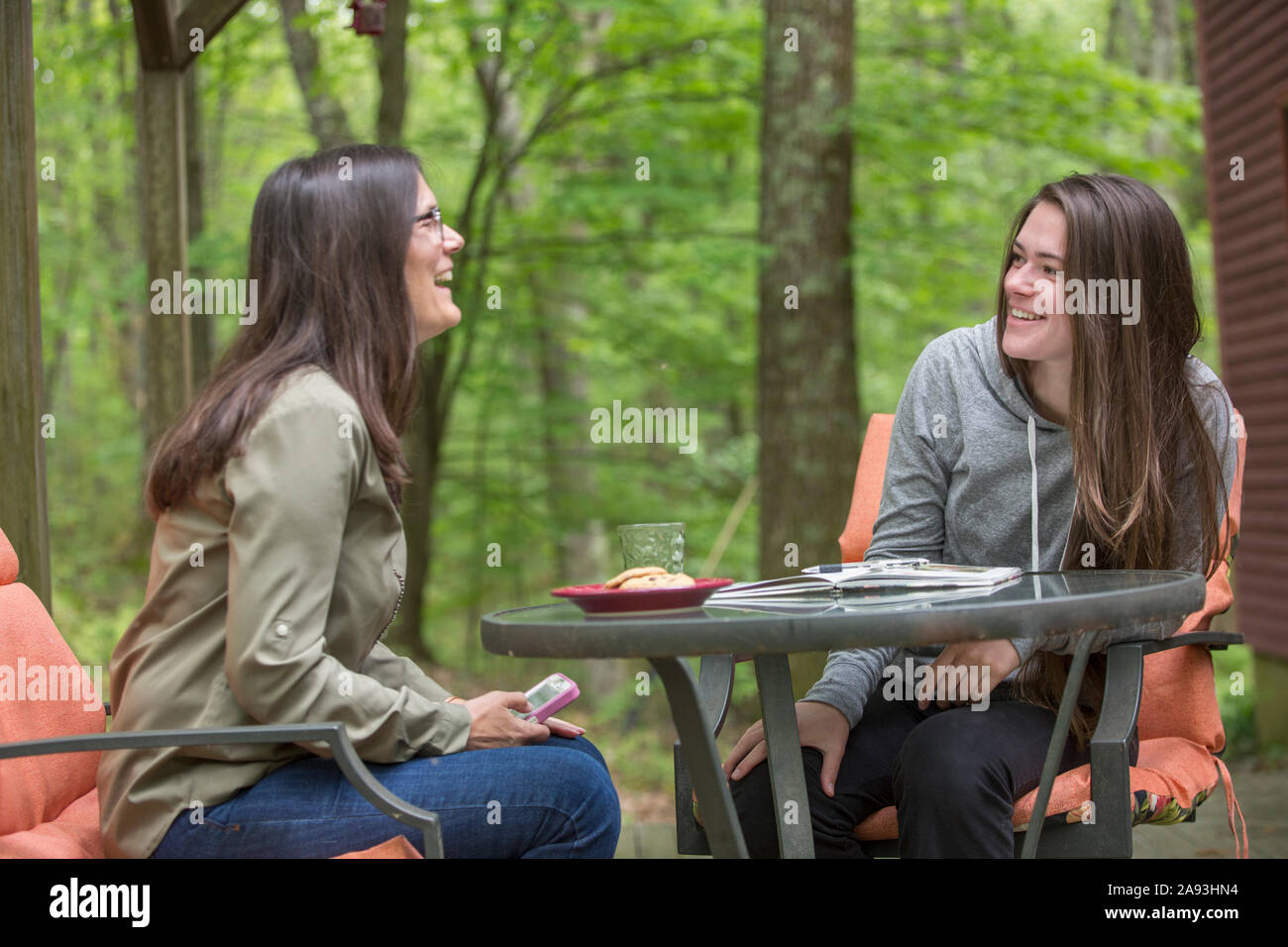 Woman with Multiple Sclerosis laughing with her daughter Stock Photo ...