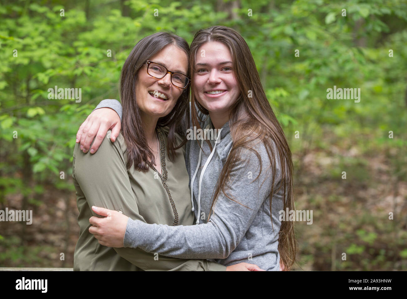 Woman with Multiple Sclerosis hugging her daughter Stock Photo - Alamy