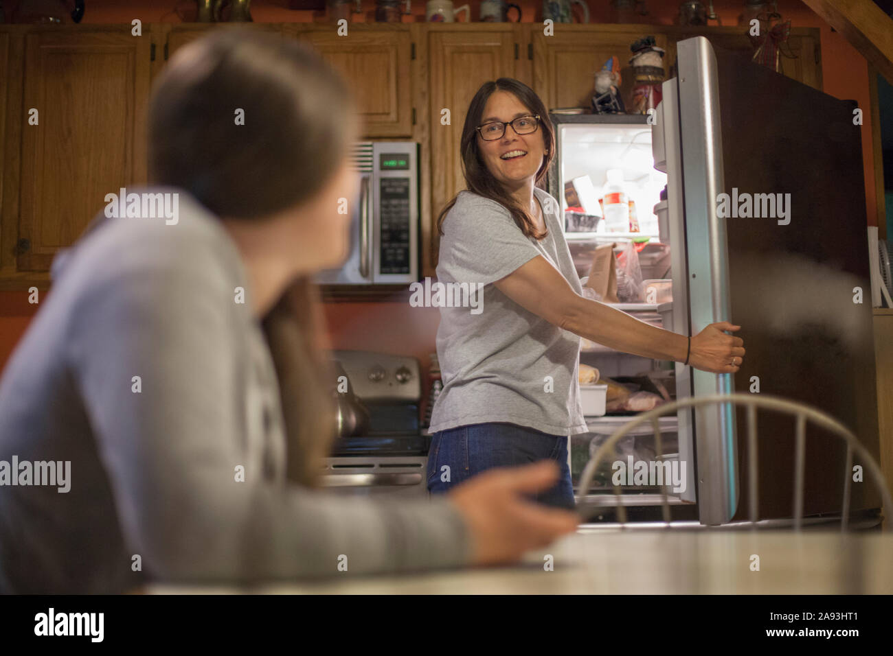 Daughter refrigerator hi-res stock photography and images - Alamy