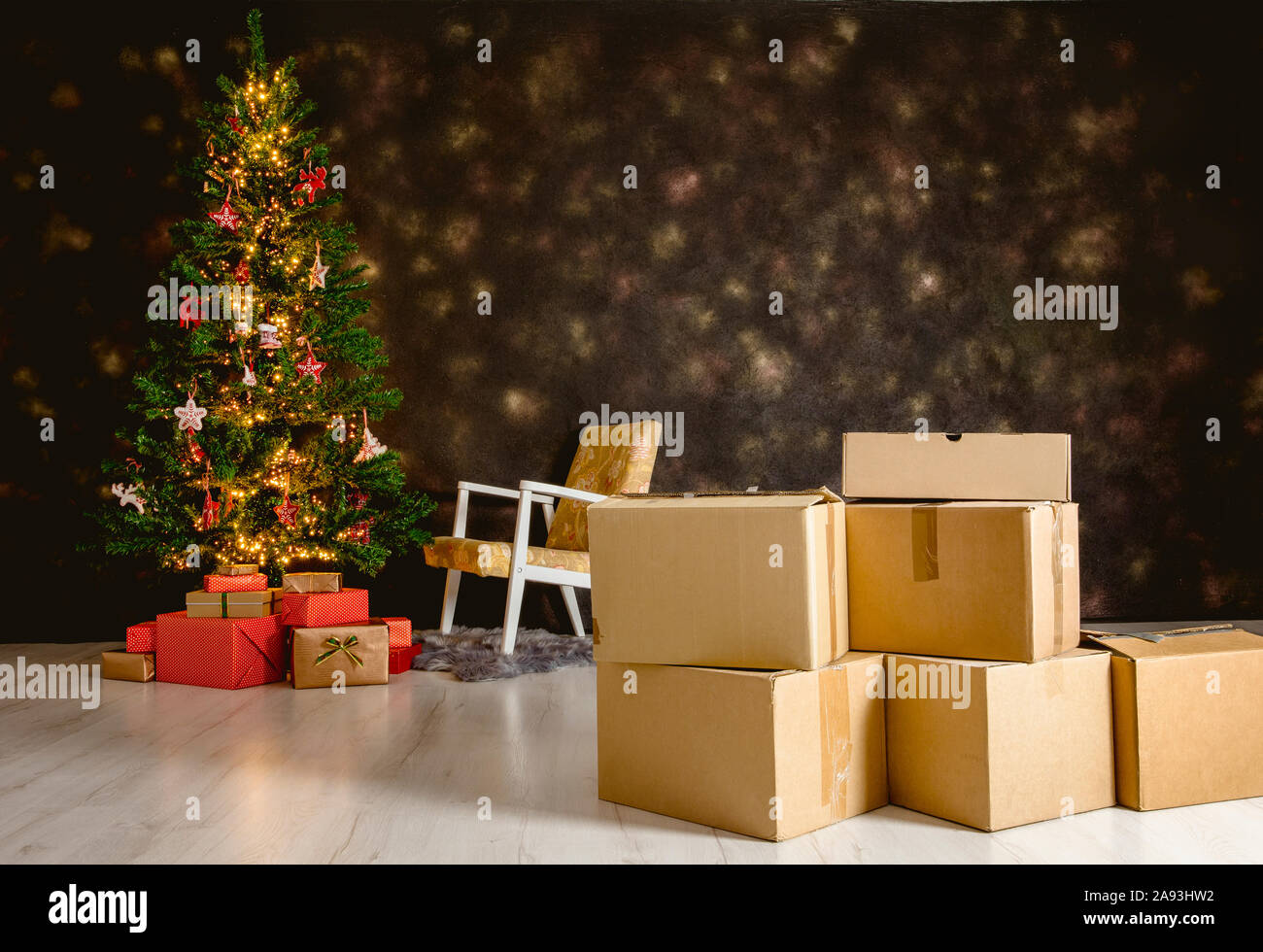 Moving in to new home for Christmas concept. Focus on cardboard ...