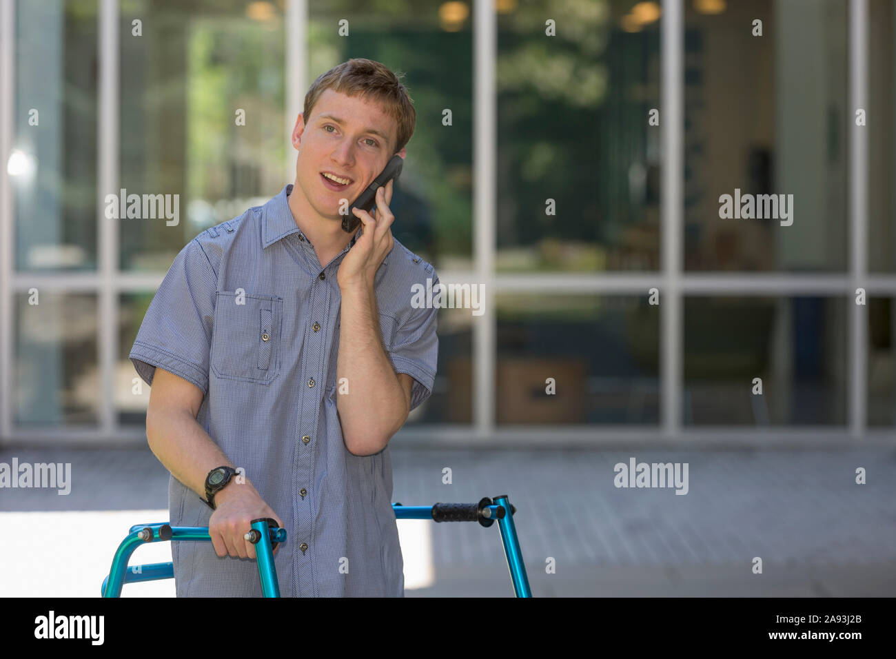 Walker using mobile phone hi-res stock photography and images - Alamy