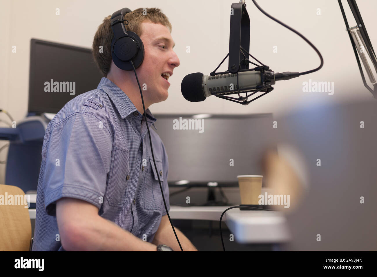 Broadcast radio man listening radio hi-res stock photography and images ...