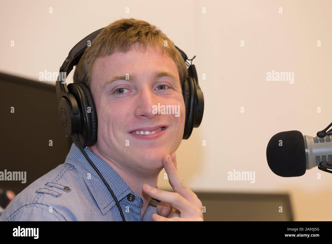 Broadcast radio man listening radio hi-res stock photography and images ...