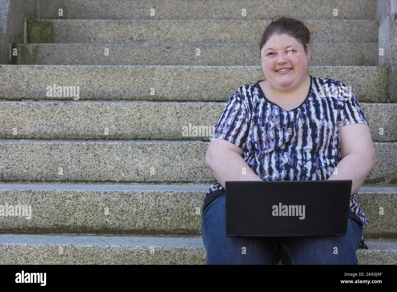 Woman with Visual Impairment using her computer Stock Photo - Alamy