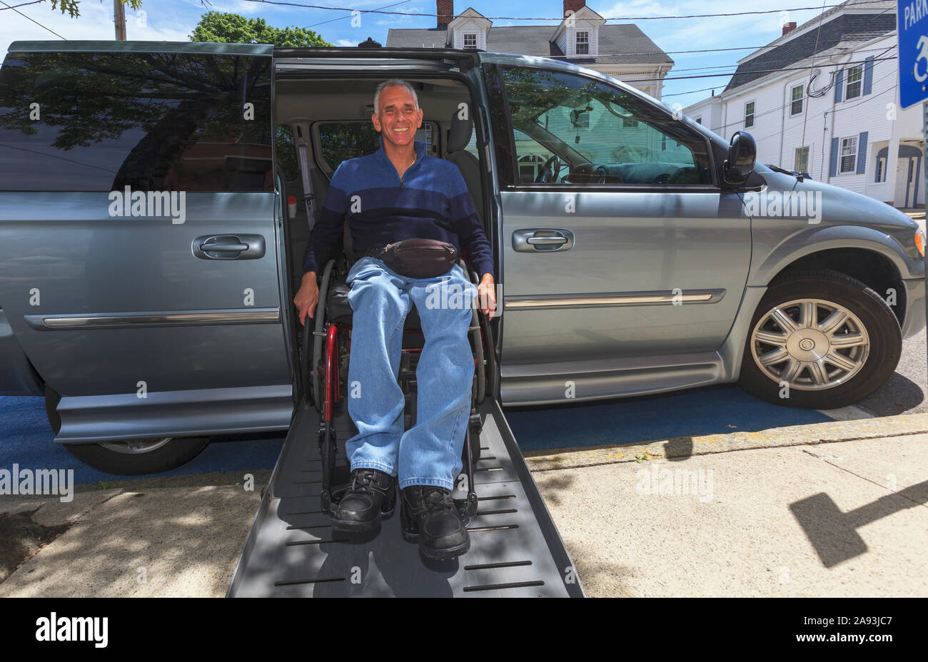 Man with Spinal Cord Injury exiting his accessible van Stock Photo - Alamy
