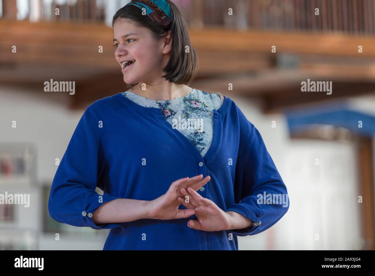 Girl with Traumatic Brain Injury performing Stock Photo - Alamy
