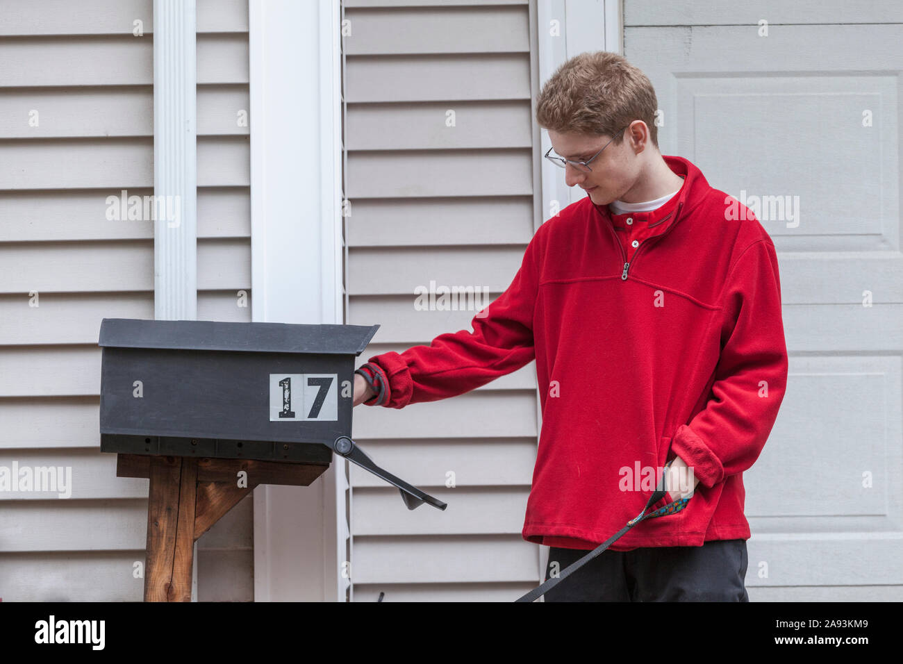 Mailbox and boy hi-res stock photography and images - Alamy