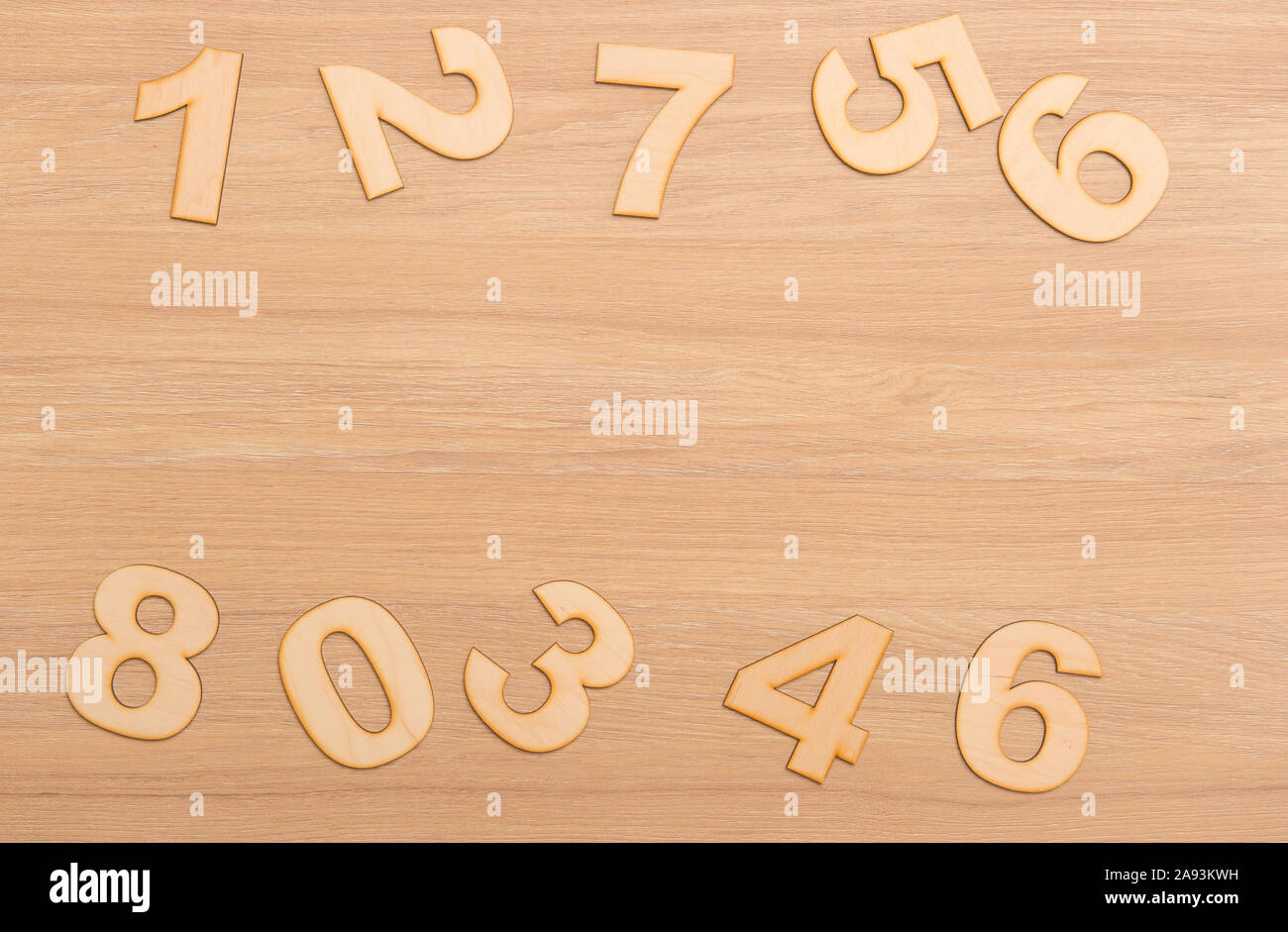 Wooden numbers on wooden background, flat lay Stock Photo - Alamy