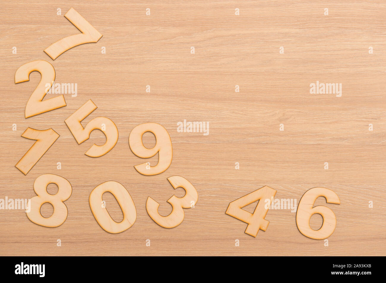 Wooden numbers on wooden background, flat lay Stock Photo - Alamy
