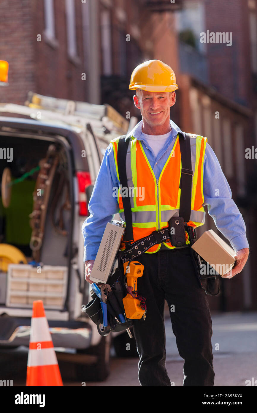 Cable installer with cable boxes from truck for installation Stock ...