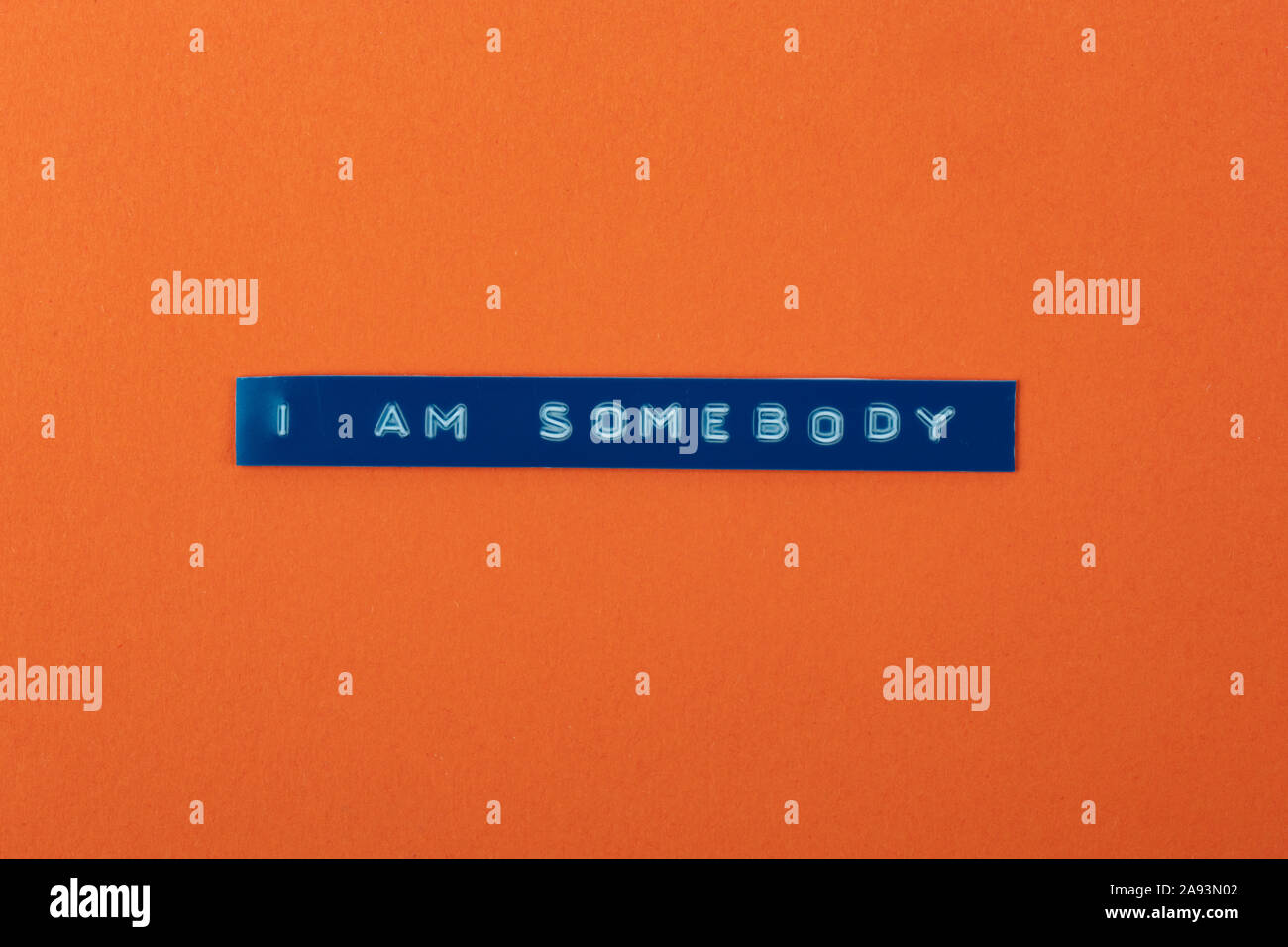 I am Somebody text with a labelprinter on orange cardboard Stock Photo ...