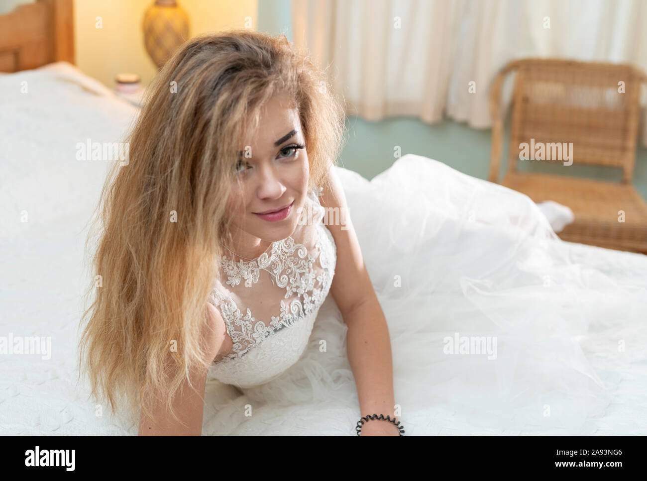 Young bride gets ready - morning sun and wedding day morning Stock ...
