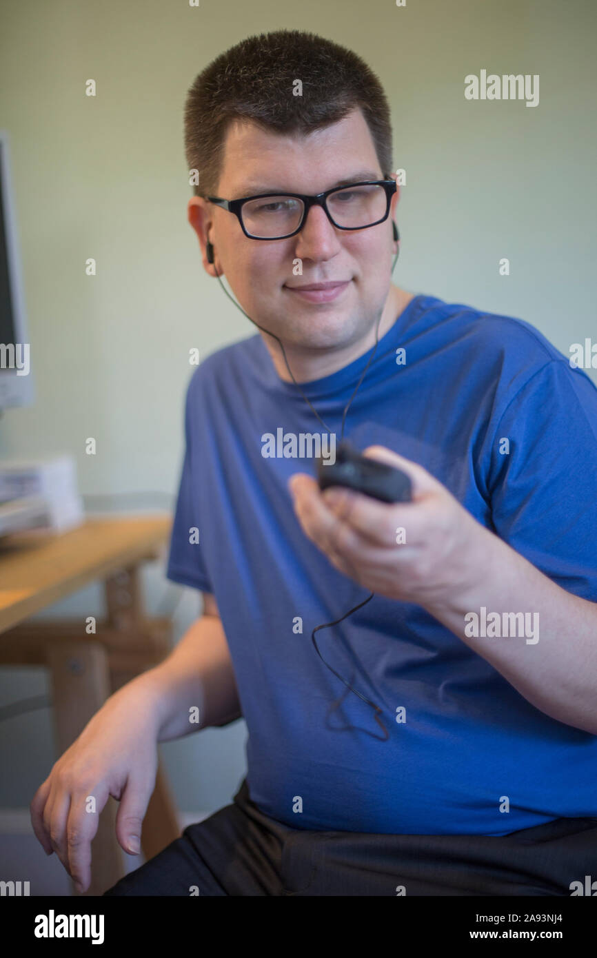 Man with Visual Impairment using his technology to communicate Stock ...